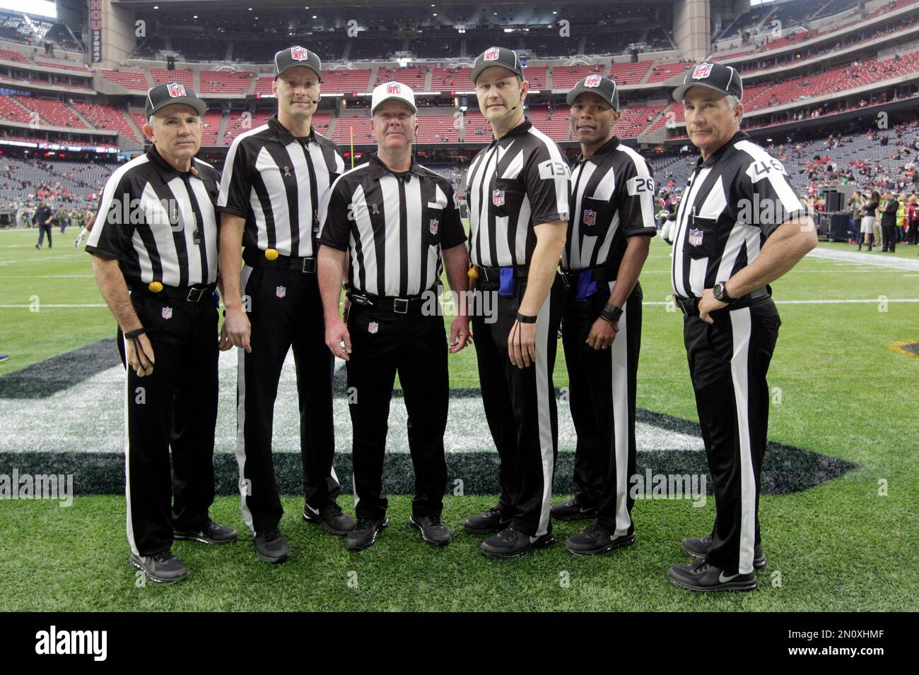 NFL officials, from left, side judge Greg Gautreaux, head linesman Dana ...