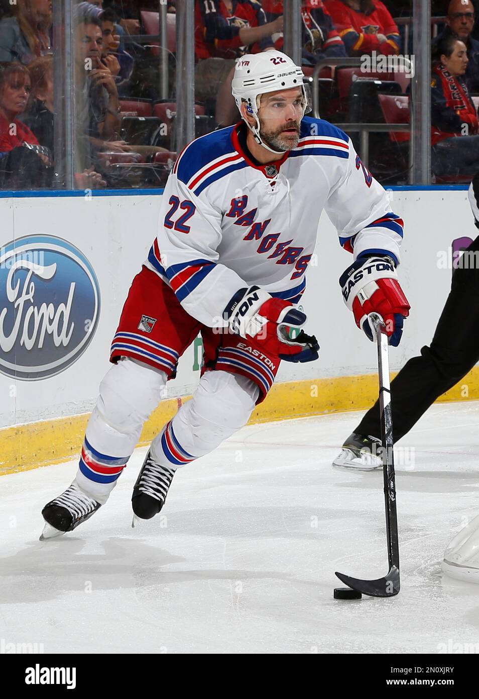 New York Rangers defenseman Dan Boyle (22) circles the net with the ...