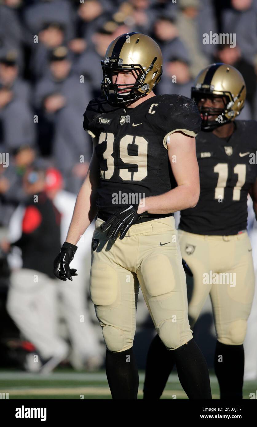 Army linebacker Jeremy Timpf (39) walks on the field during the second ...