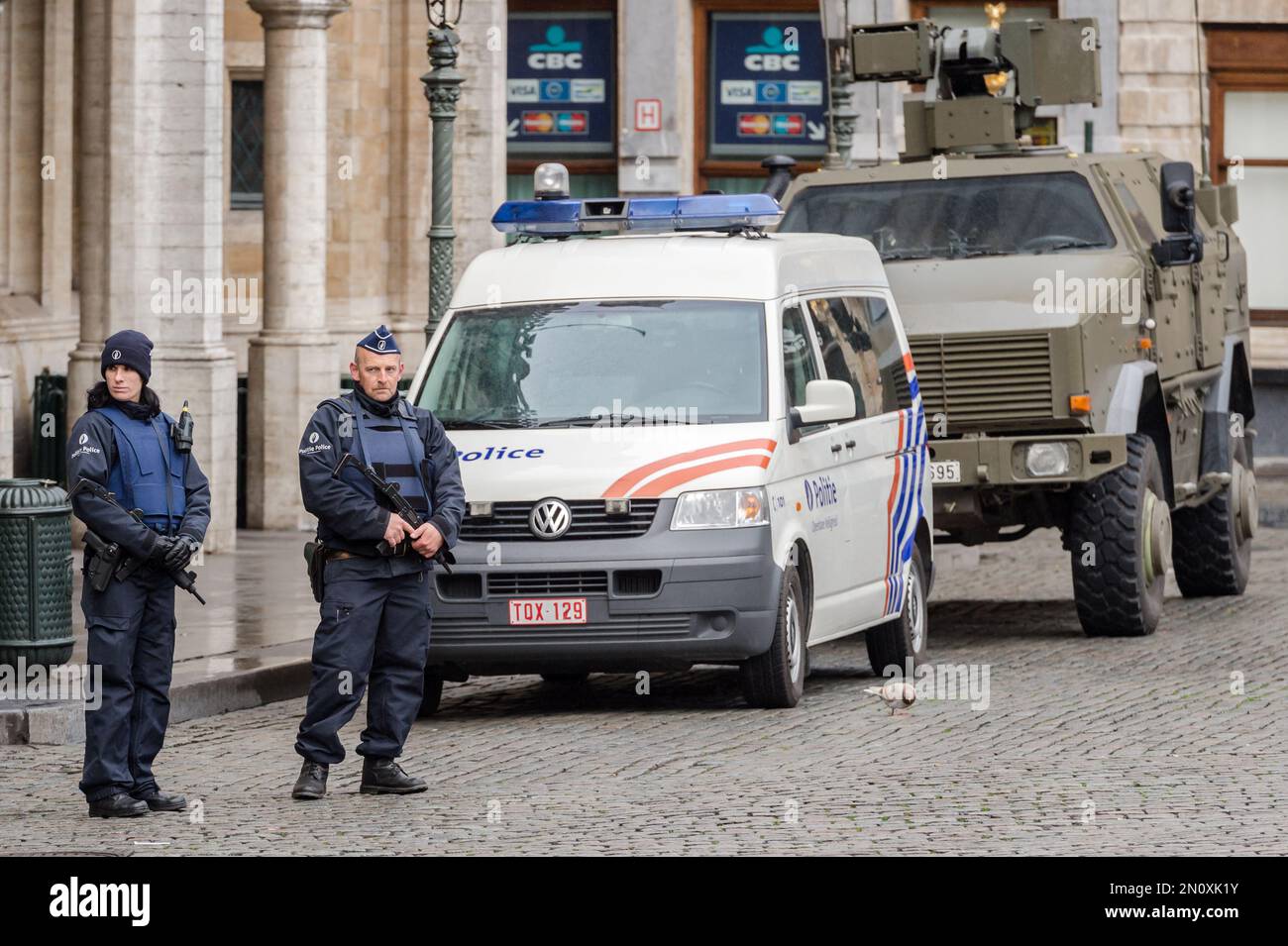 Police officers patrol on the Grand Place in Brussels on Sunday, Nov ...