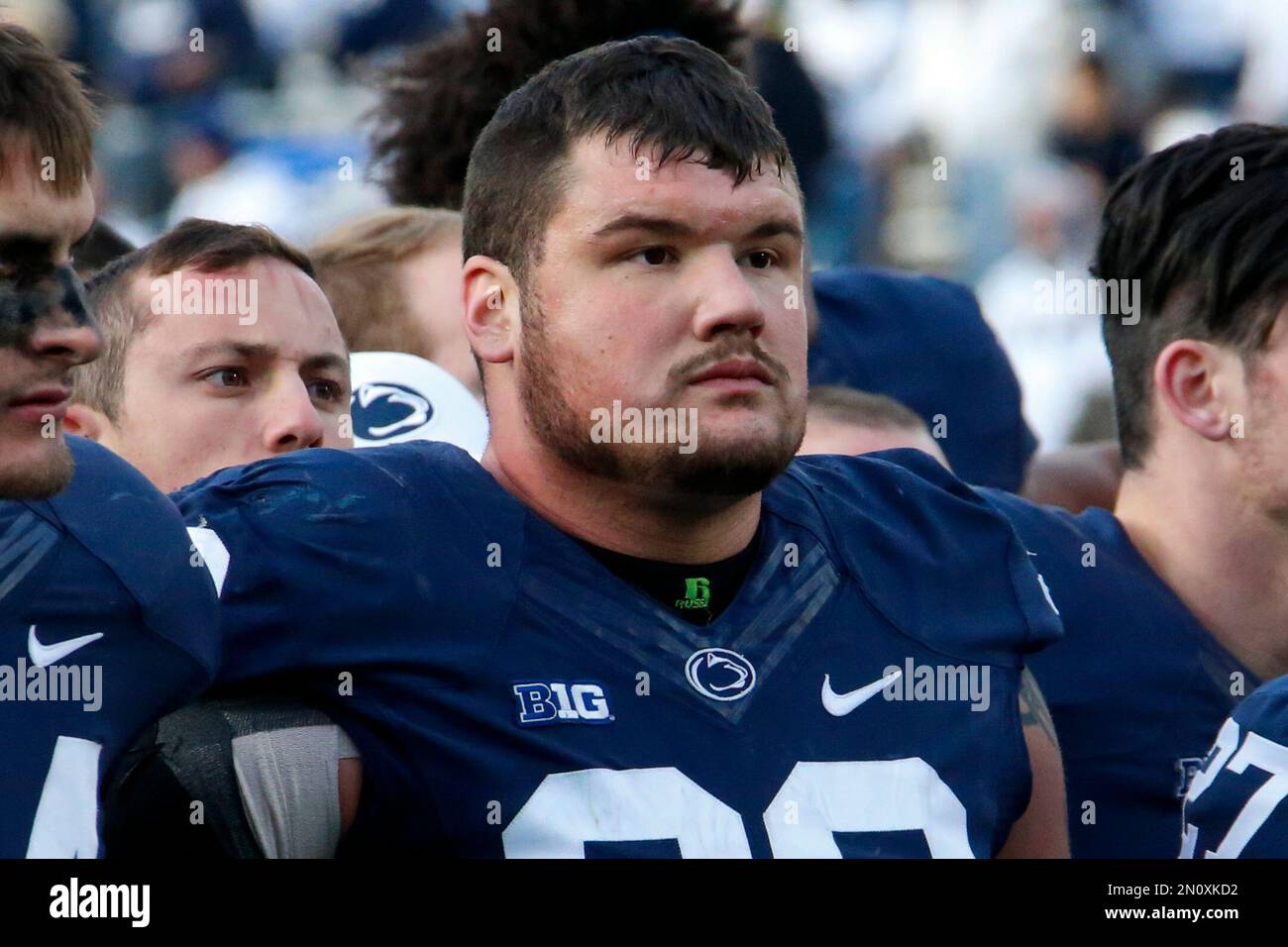 Penn State defensive tackle Anthony Zettel (98) stands with teammates ...