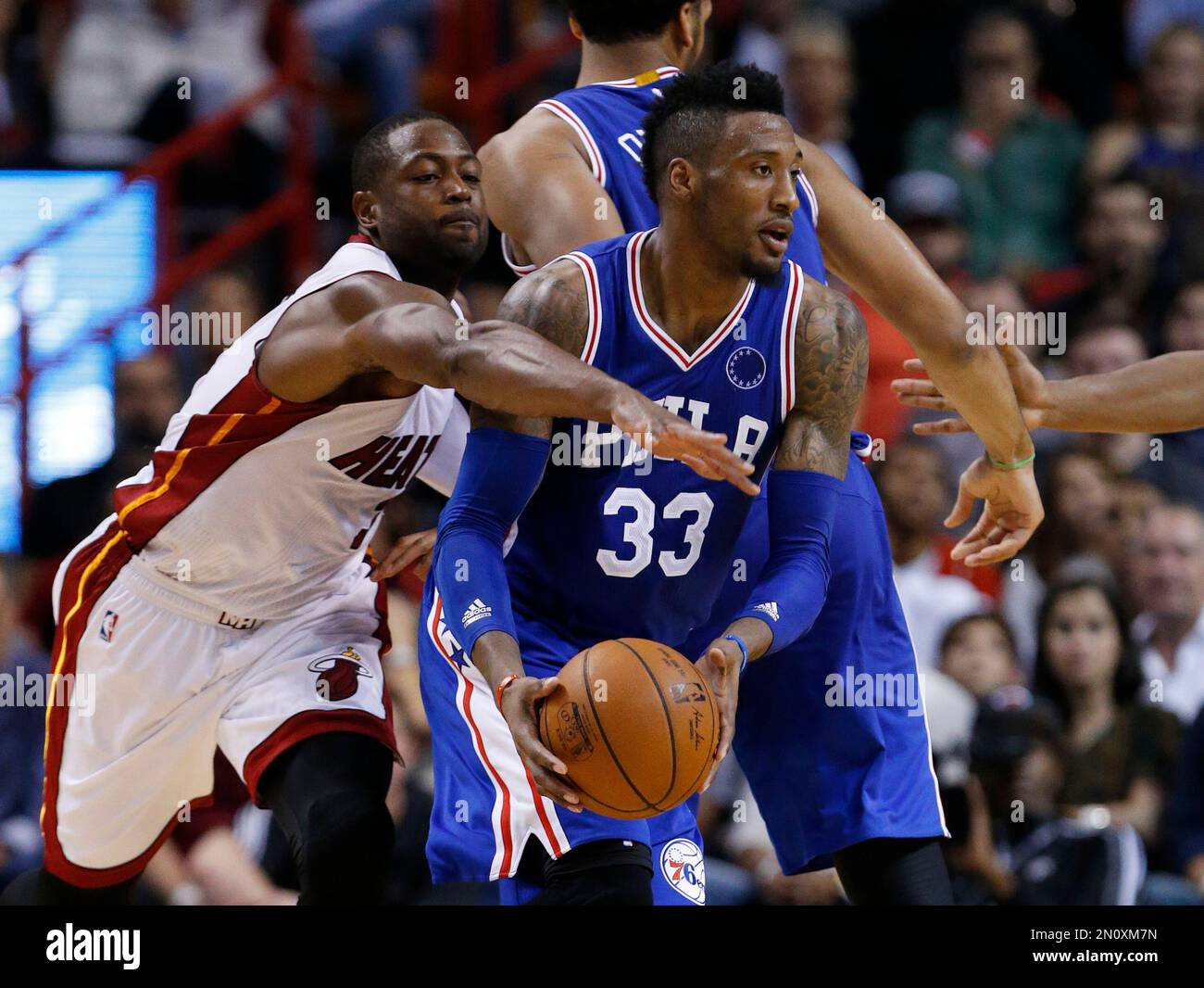 Miami Heat guard Dwyane Wade, left, strips Philadelphia 76ers forward ...