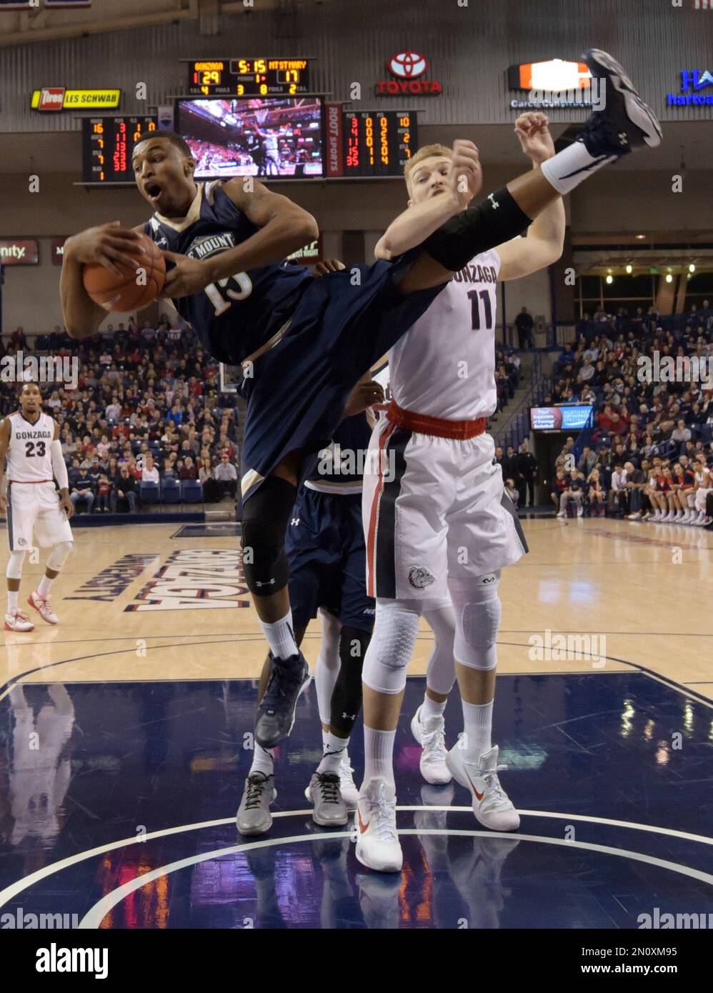Mount St. Mary’s Gregory Graves (15) fights for a rebound against Gonzaga’s Domantas Sabonis (11 ...