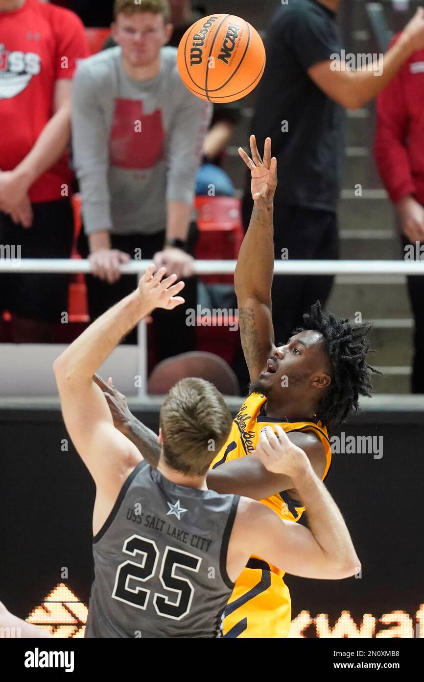 Utah guard Rollie Worster (25) defends against California guard Joel ...