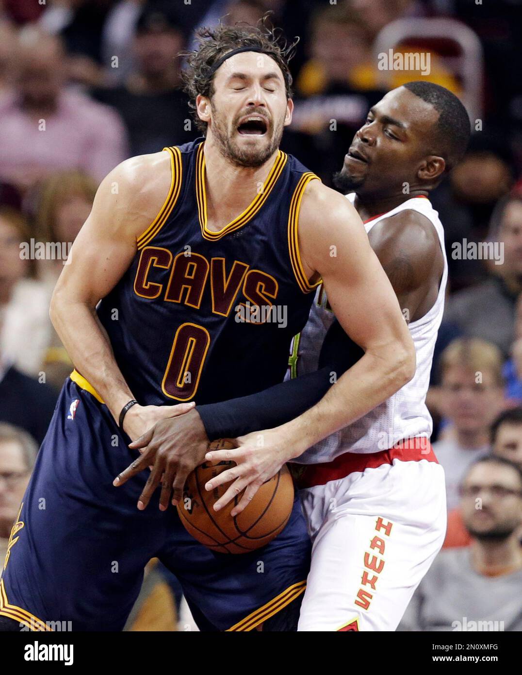 Atlanta Hawks' Paul Millsap, right, fouls Cleveland Cavaliers' Kevin ...
