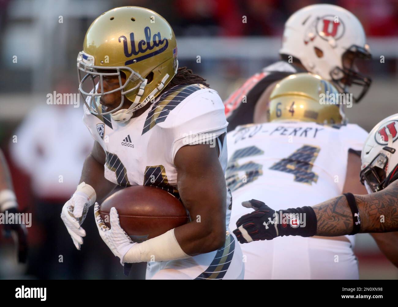 UCLA running back Paul Perkins runs the ball in the second half of an ...