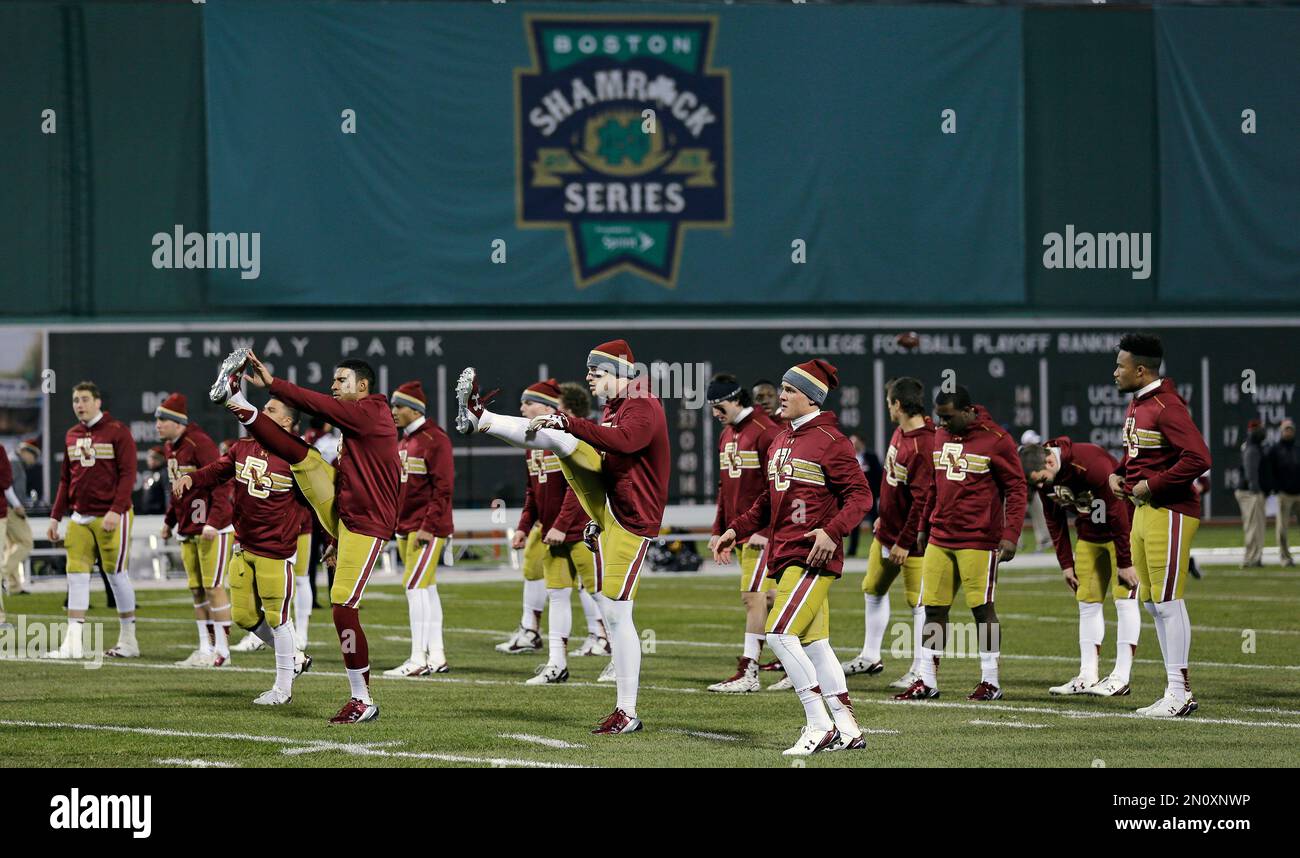 Boston College players warm up prior to the Shamrock Series NCAA ...
