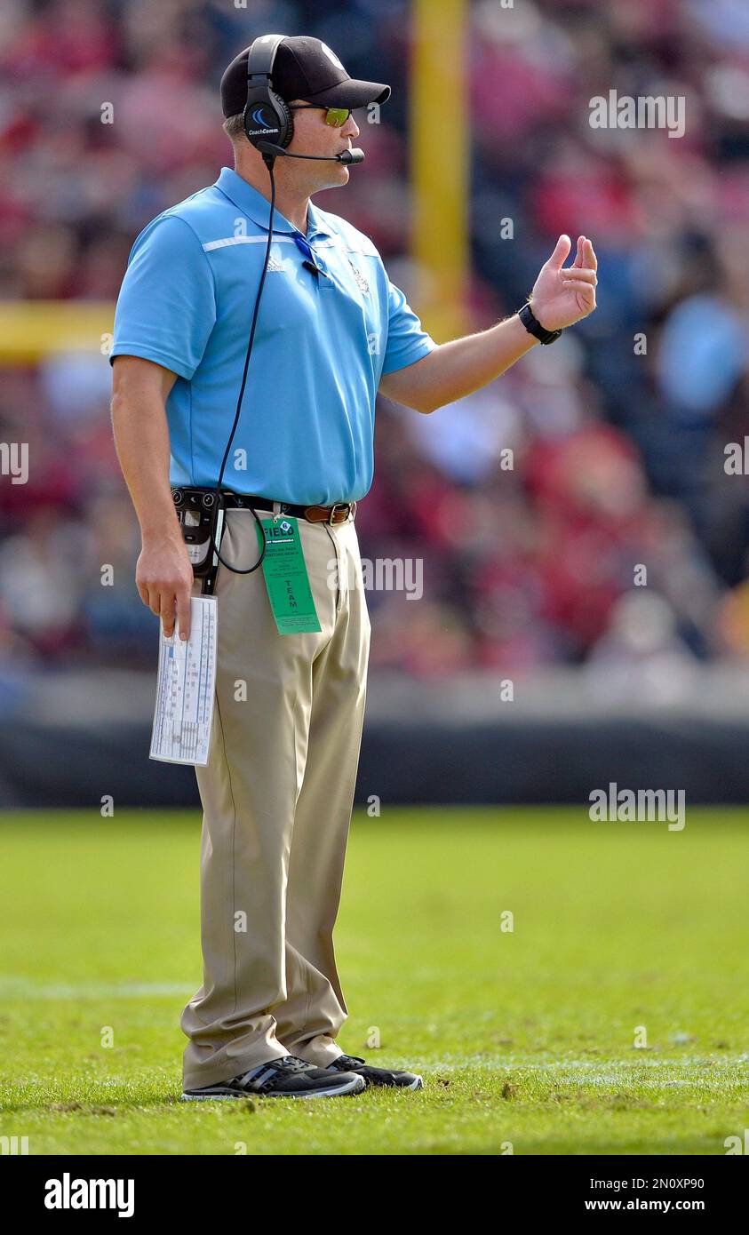 Citadel head coach Mike Houston gestures to a player during the first ...