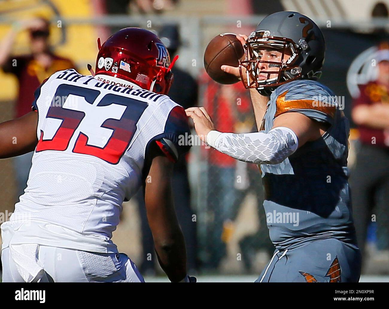 Arizona State quarterback Mike Bercovici (2) is pressured by Arizona ...