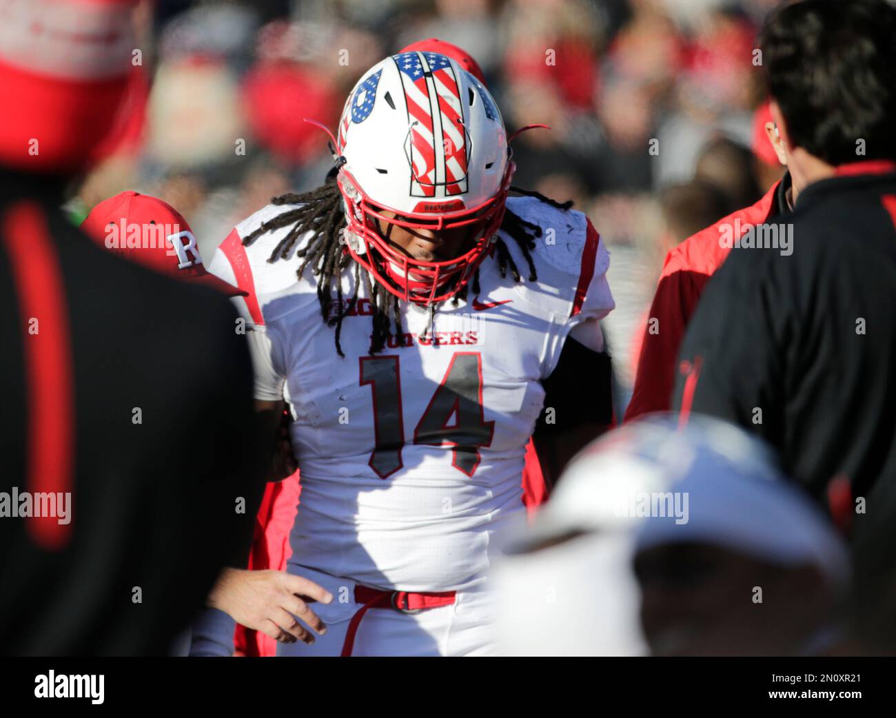 Rutgers linebacker Kaiwan Lewis (14) leaves the field after an injury ...