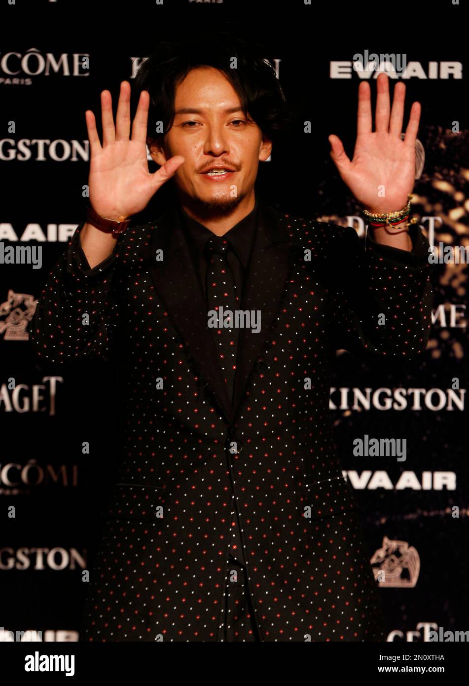 Taiwanese actor Chang Chen poses on the red carpet at the 52nd Golden ...
