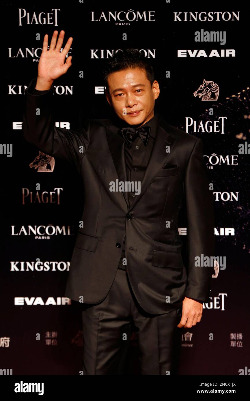 Taiwanese actor Lee Kang-sheng poses on the red carpet at the 52nd ...