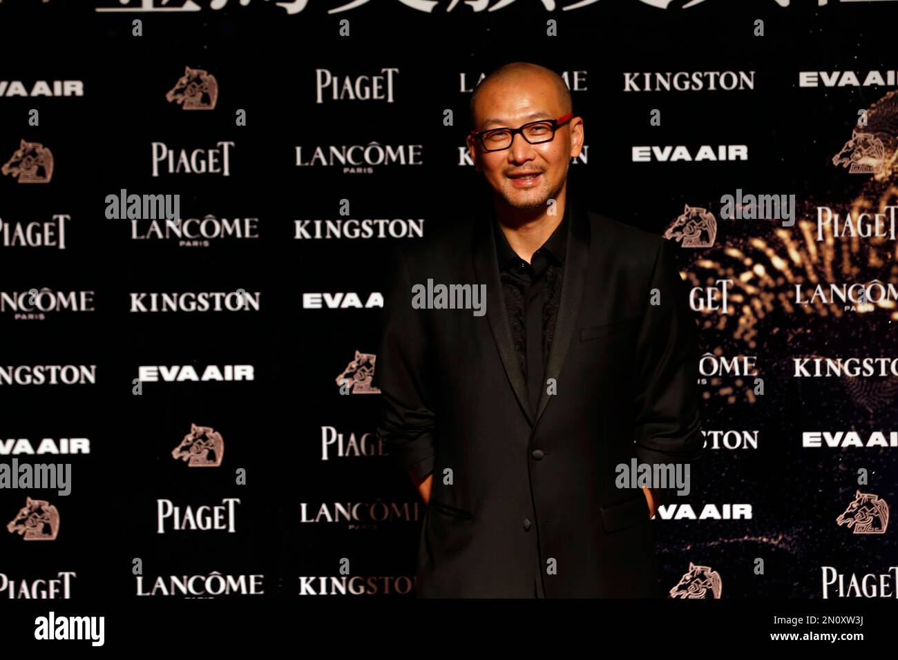 Chinese director Guan Hu poses on the red carpet at the 52nd Golden ...
