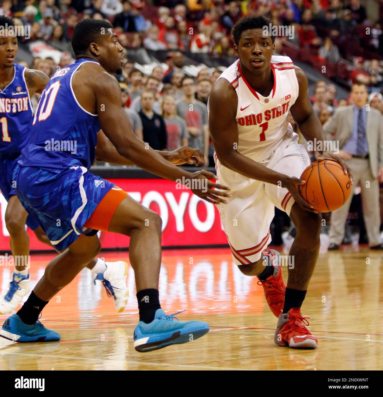Ohio State's Jae'Sean Tate, right, works against Texas-Arlington's ...