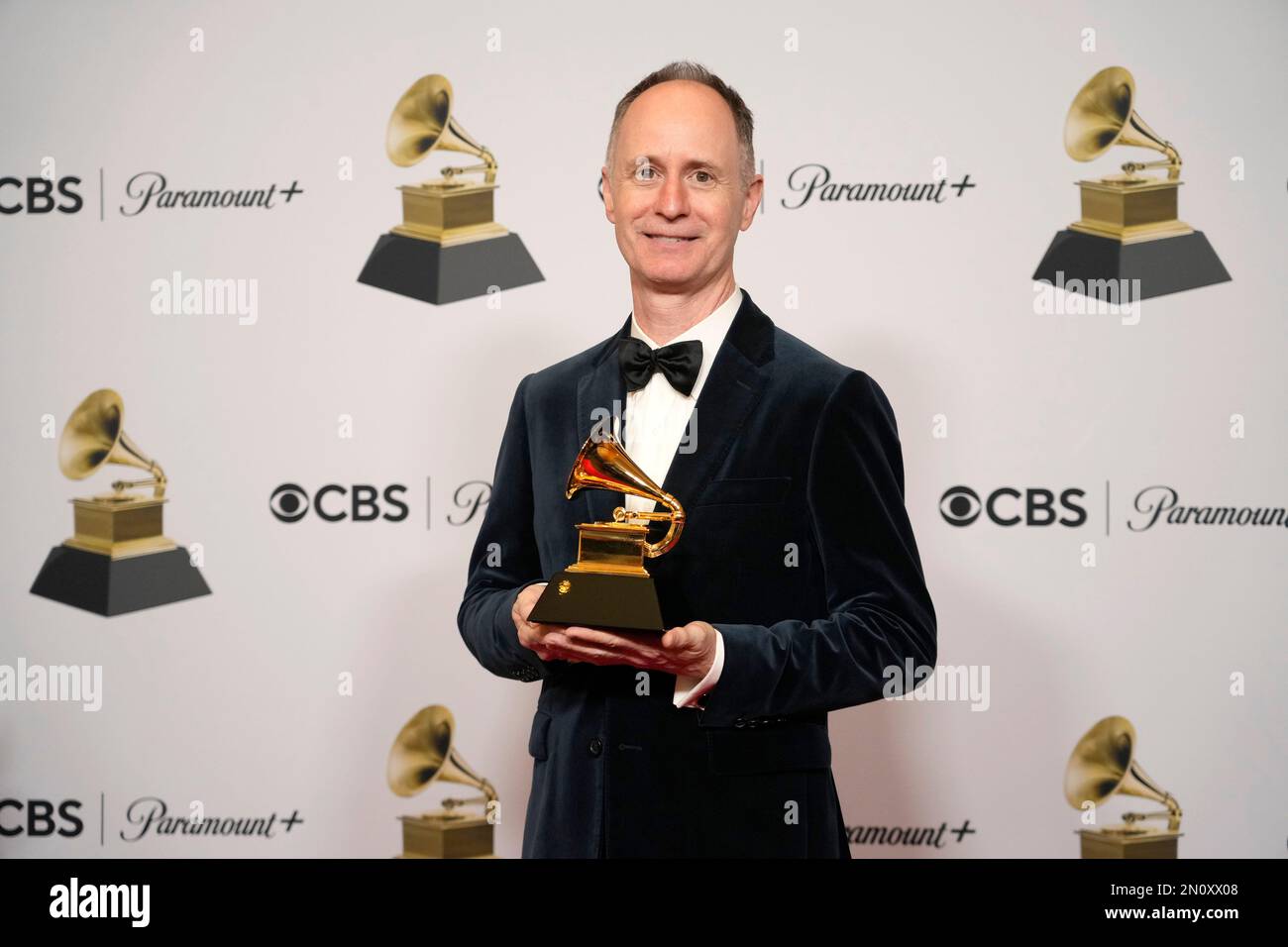Tom MacDougall poses in the press room with the award for best compilation soundtrack for visual ...