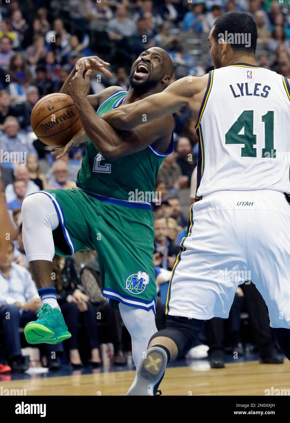 Dallas Mavericks guard Raymond Felton (2) is fouled by Utah Jazz ...