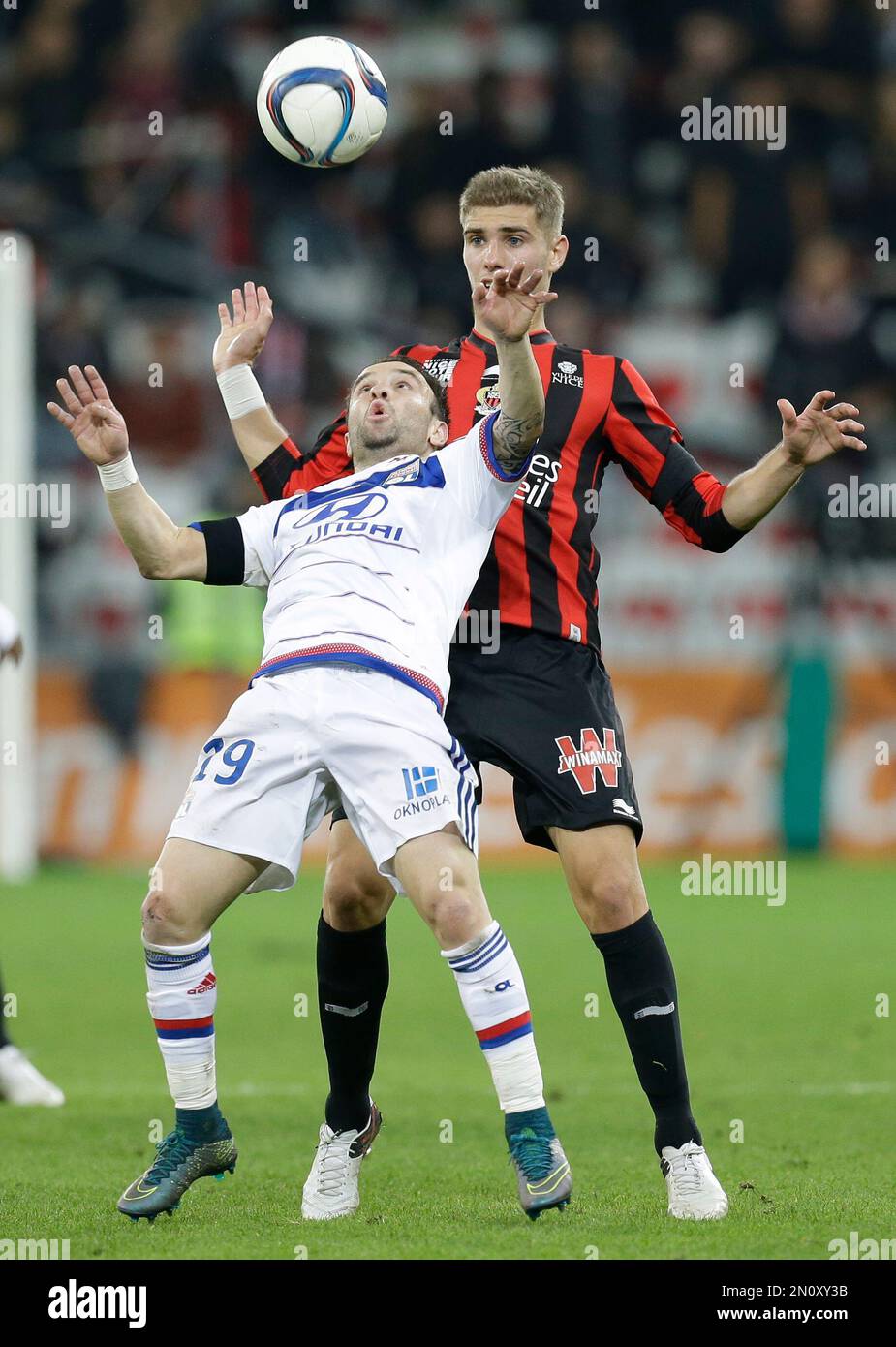 Lyon's Mathieu Valbuena, front, challenges for the ball with Nice's ...