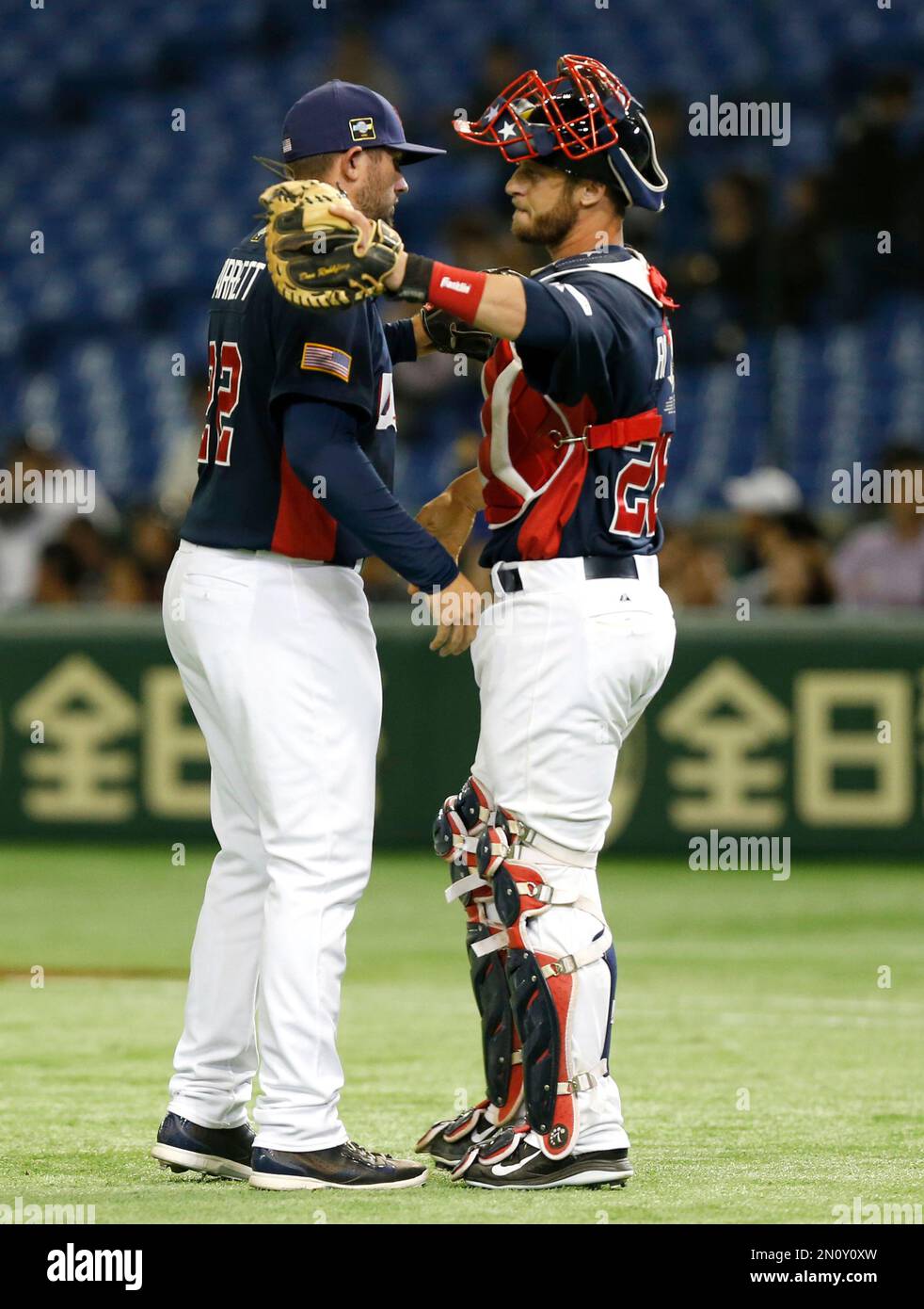 USA's closer Jake Barrett, left, celebrates with catcher Dan Rohlfing ...