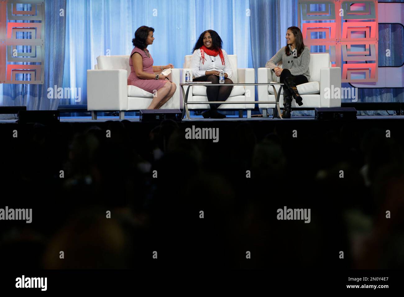 World Cup soccer champion Carli Lloyd, right, speaks with Tamala ...