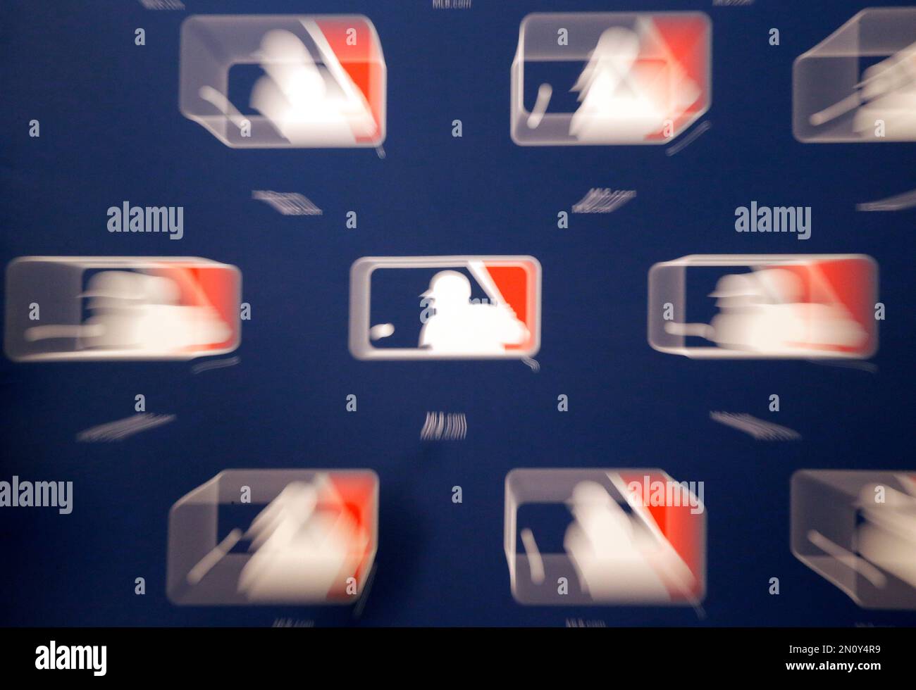 A slow shutter speed and lens zoom creates a blur of the Major League ...