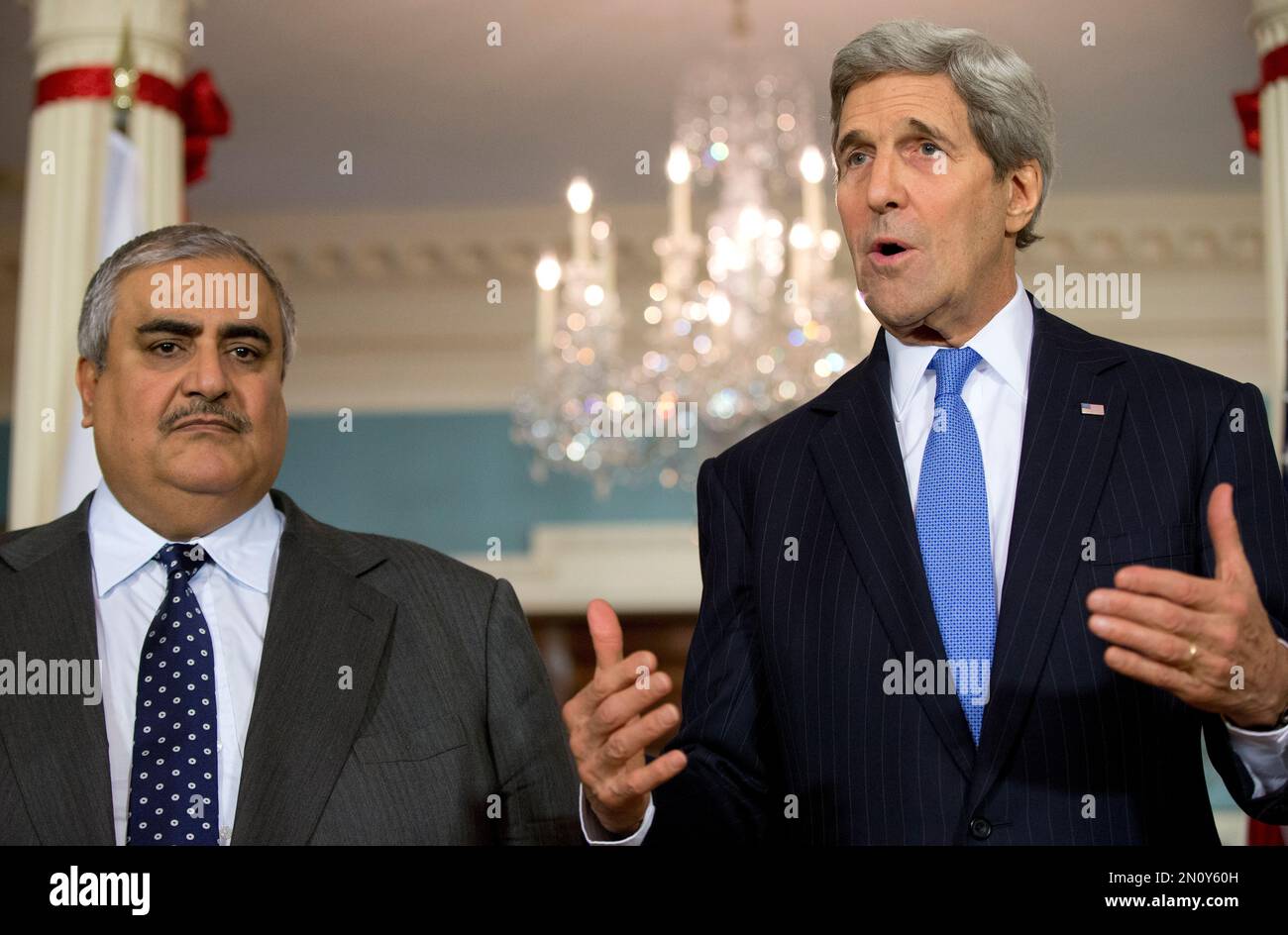 Secretary of State John Kerry, accompanied by Bahrain's Foreign ...
