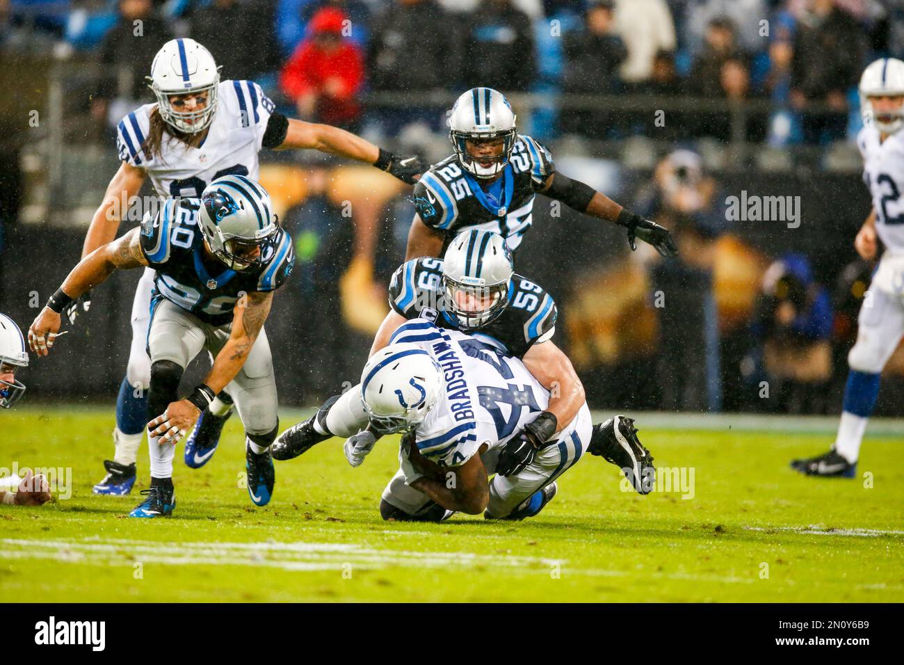 Carolina Panthers middle linebacker Luke Kuechly (59) tackles ...