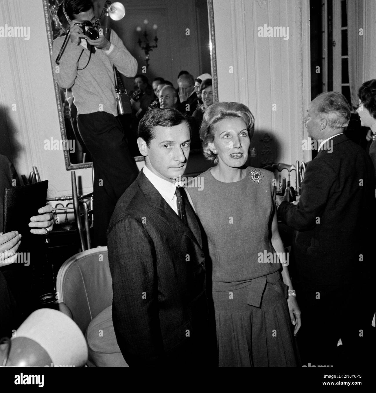 Young designer of the Dior shop, Marc Bohan, is pictured with his wife ...