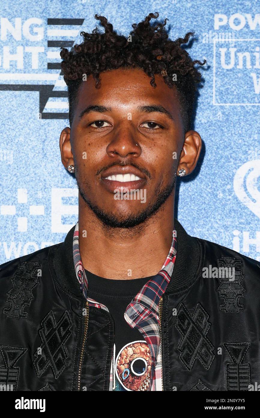Nick Young poses backstage at the Shining a Light: A Concert for ...