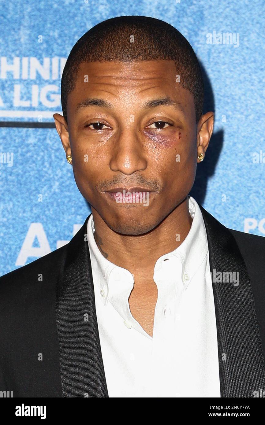 Pharrell Williams poses backstage at the Shining a Light: A Concert for ...