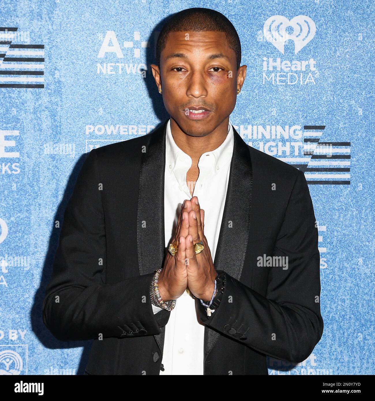 Pharrell Williams poses backstage at the Shining a Light: A Concert for ...