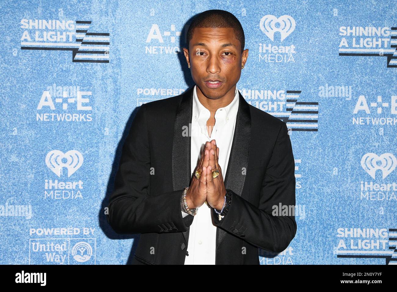 Pharrell Williams poses backstage at the Shining a Light: A Concert for ...