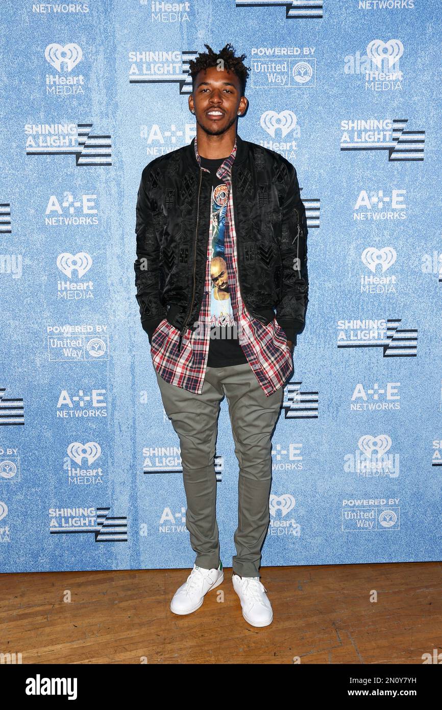 Nick Young poses backstage at the Shining a Light: A Concert for ...