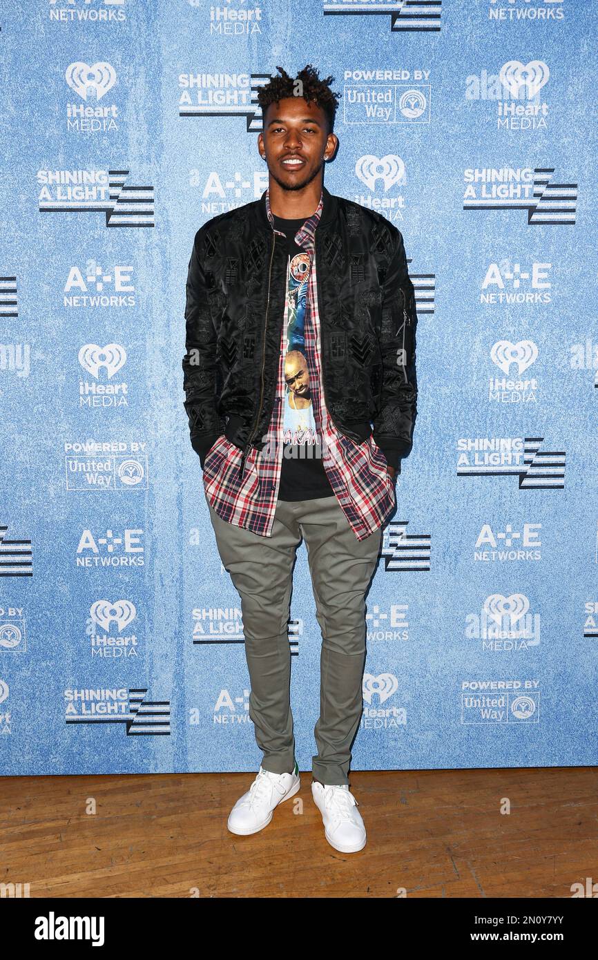 Nick Young poses backstage at the Shining a Light: A Concert for ...