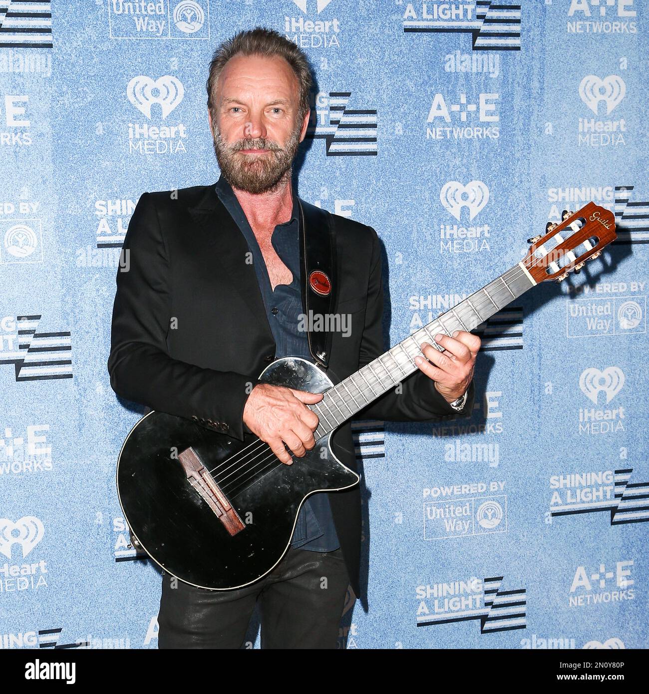 Sting poses backstage at the Shining a Light: A Concert for Progress on ...