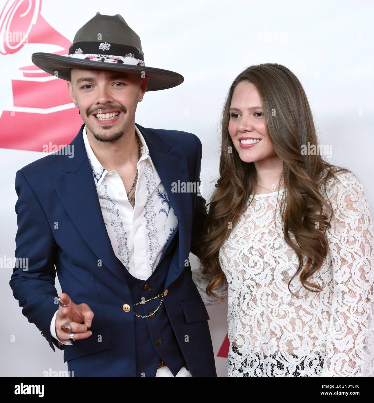 Jesse Huerta, left, and Joy Huerta, of Jesse & Joy, arrive at the Latin ...