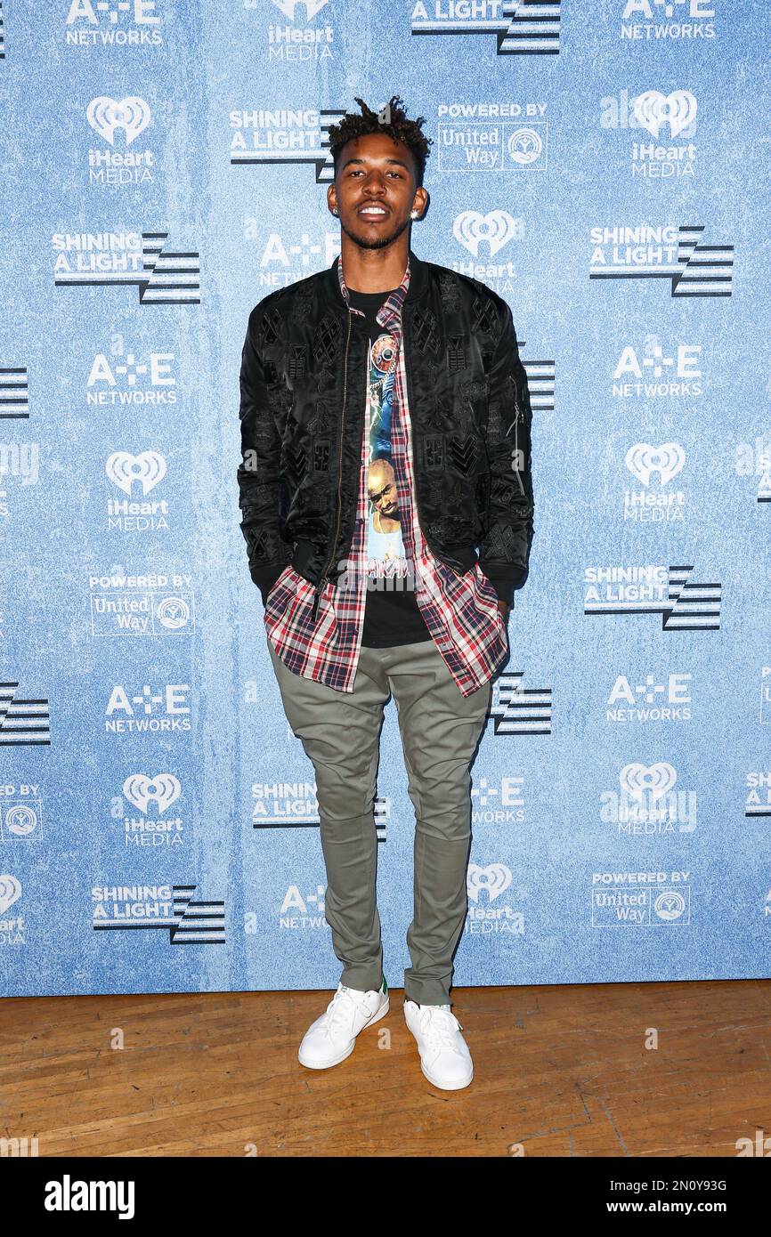 Nick Young poses backstage at the Shining a Light: A Concert for ...