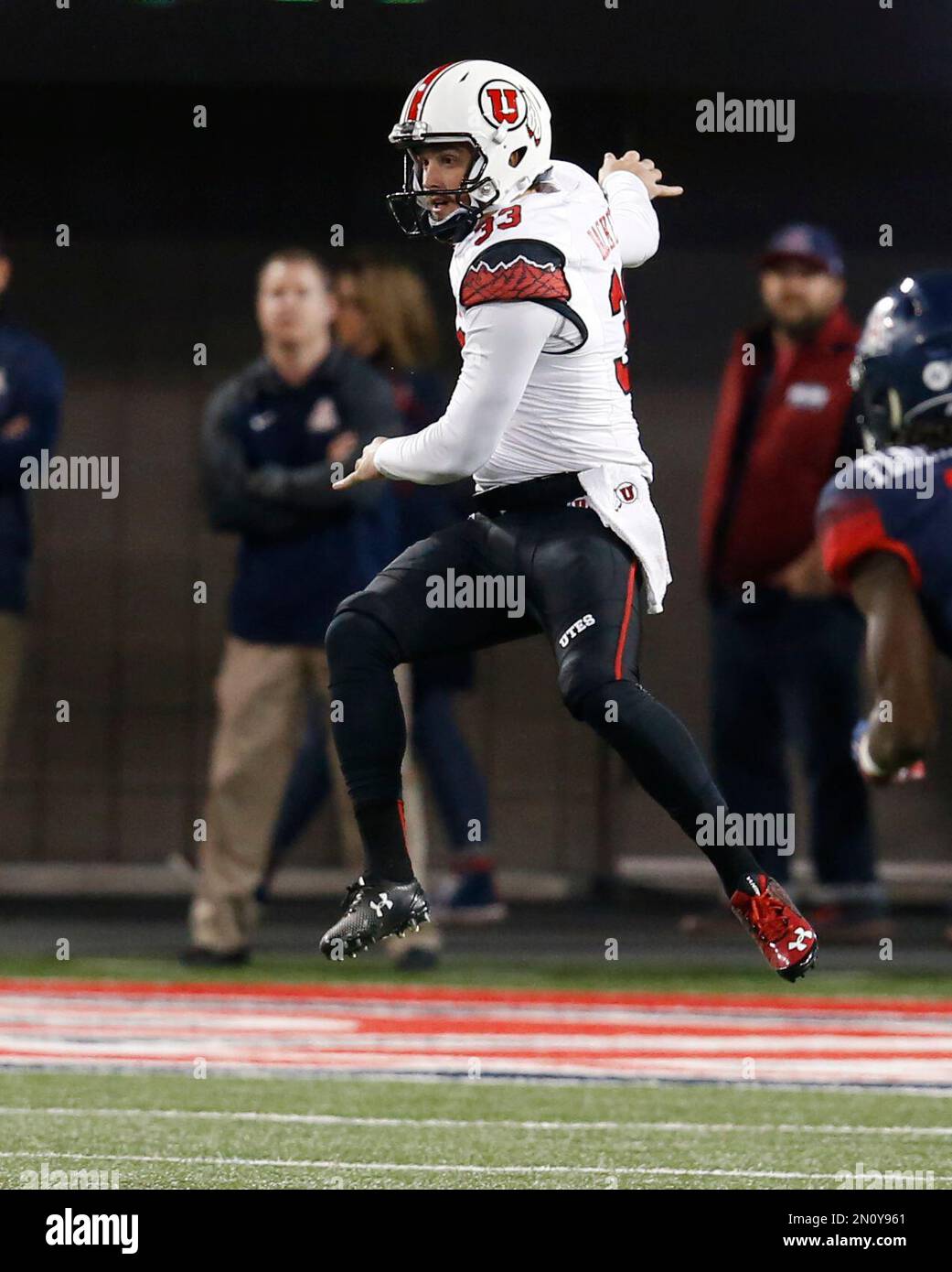 Utah punter Tom Hackett (33) during the first half of an NCAA college ...