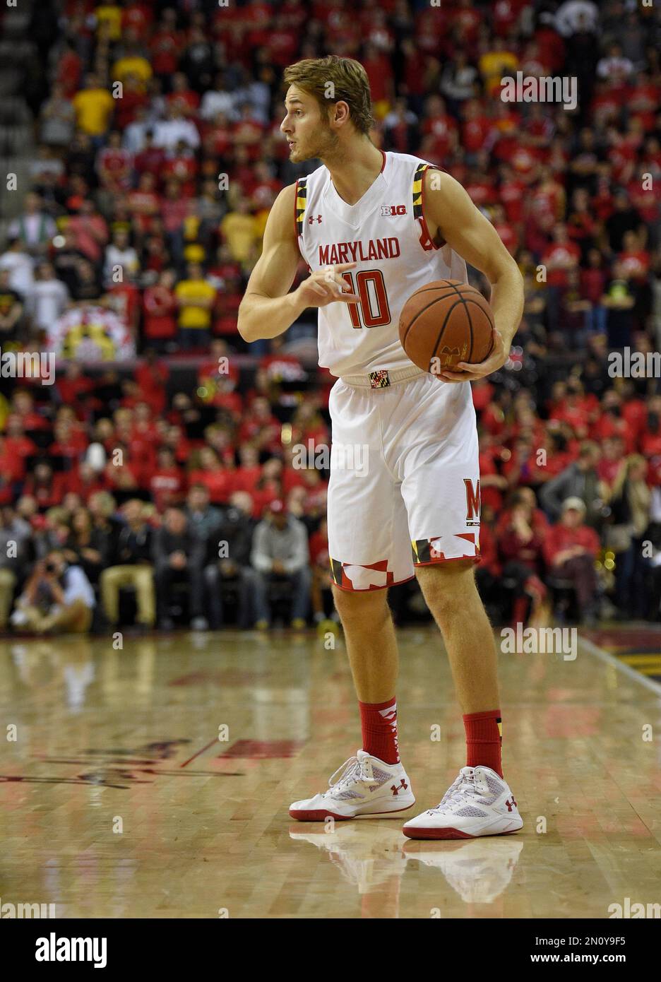 Maryland forward Jake Layman (10) handles the ball against Mount St ...