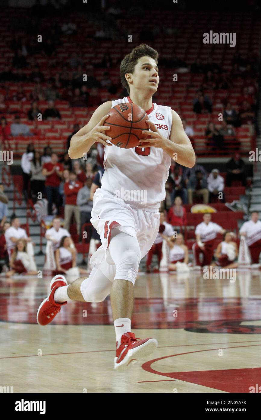 Arkansas' Dusty Hannahs runs down the court on a breakaway during the ...