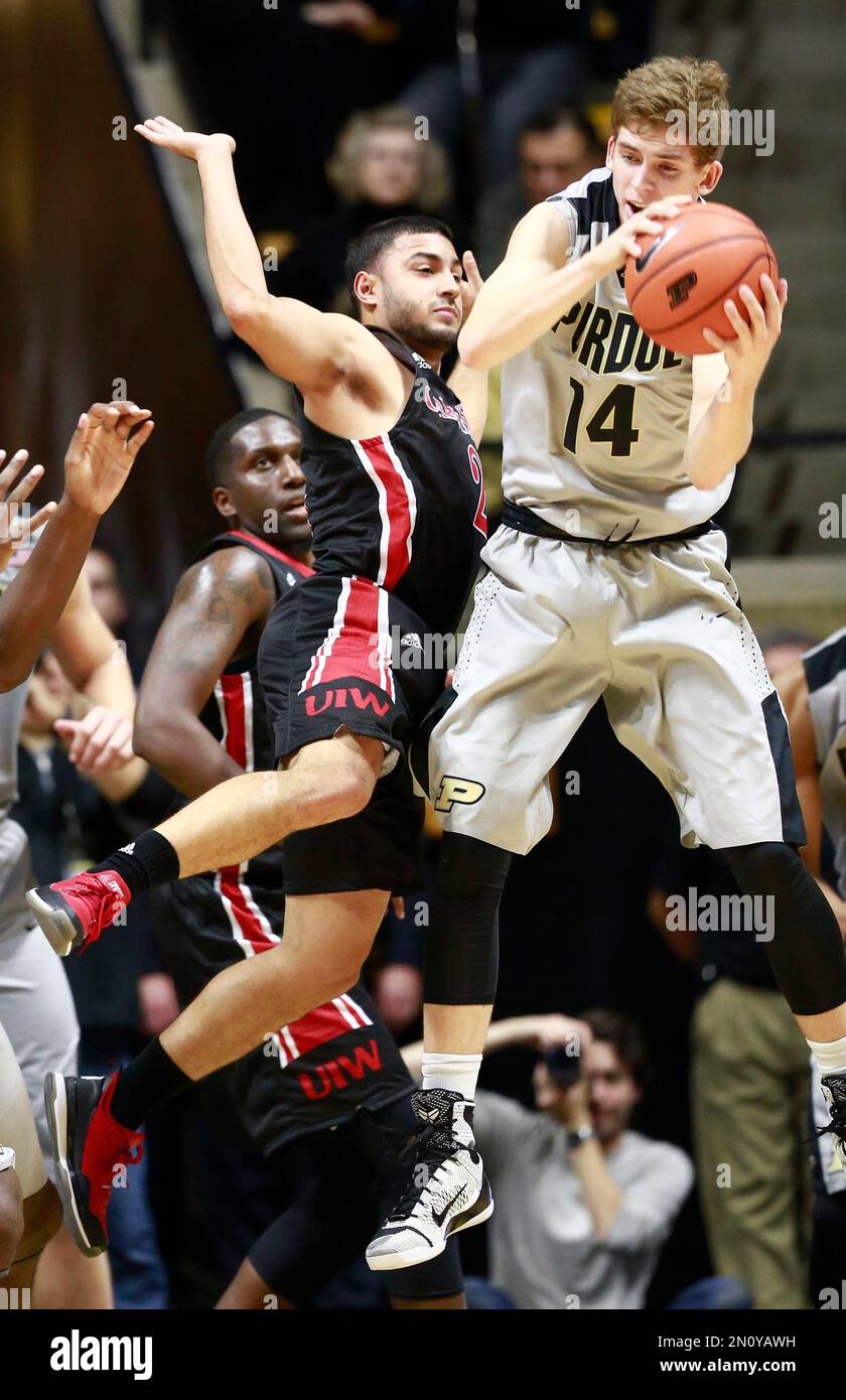 Purdue guard Ryan Cline (14) rebounds the ball against Incarnate Word ...