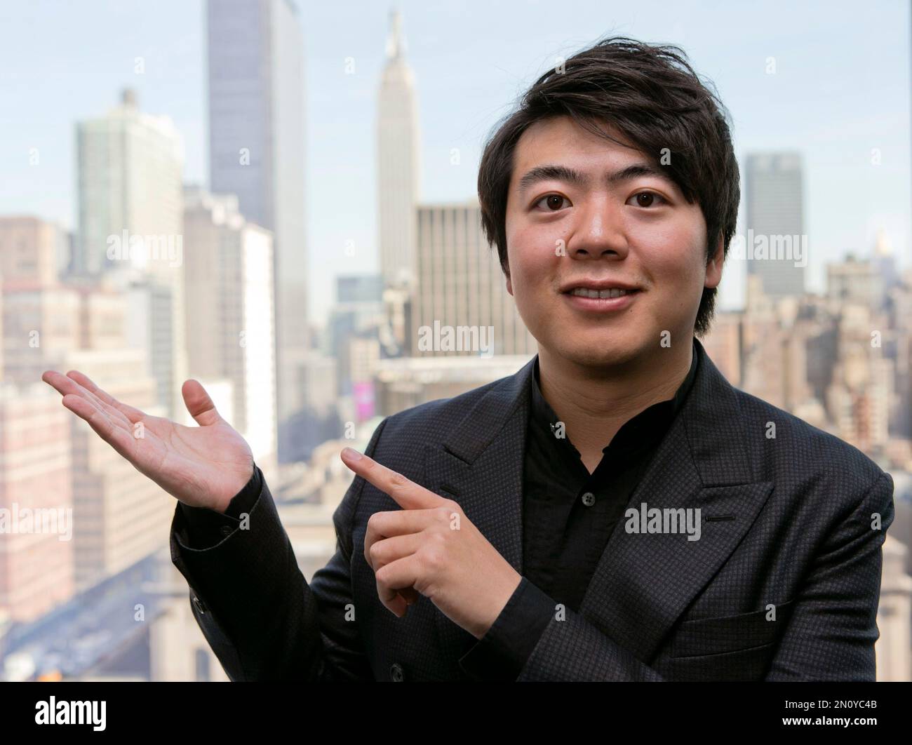 Chinese concert pianist Lang Lang poses for a photograph with the ...
