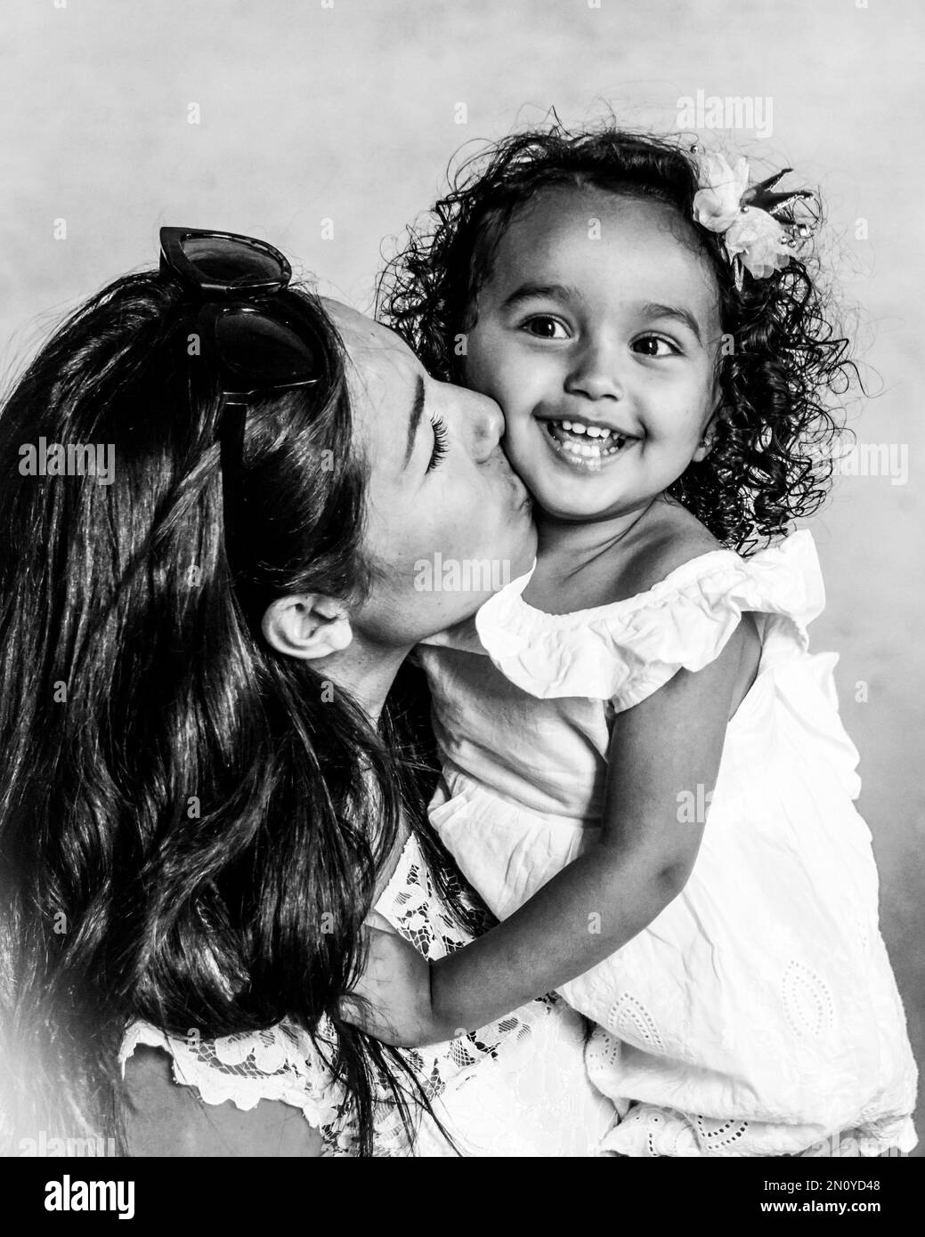 Portrait of mother with daughter at home Stock Photo - Alamy