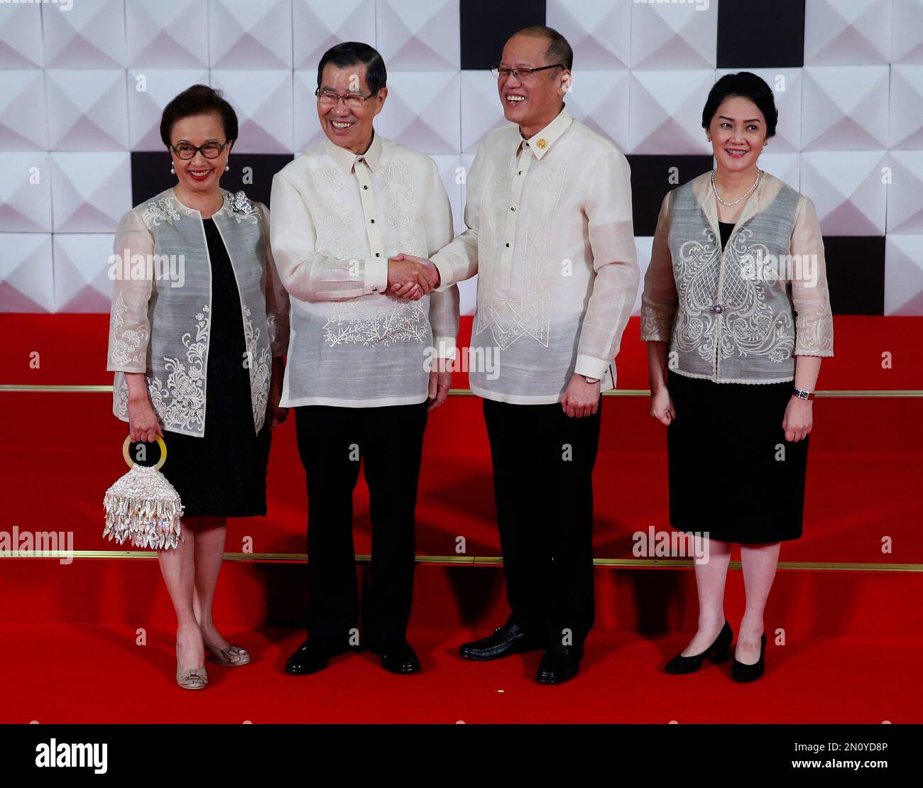 Philippines President Benigno Aquino III and his sister Maria Elena Aquino-Cruz, right, welcome ...