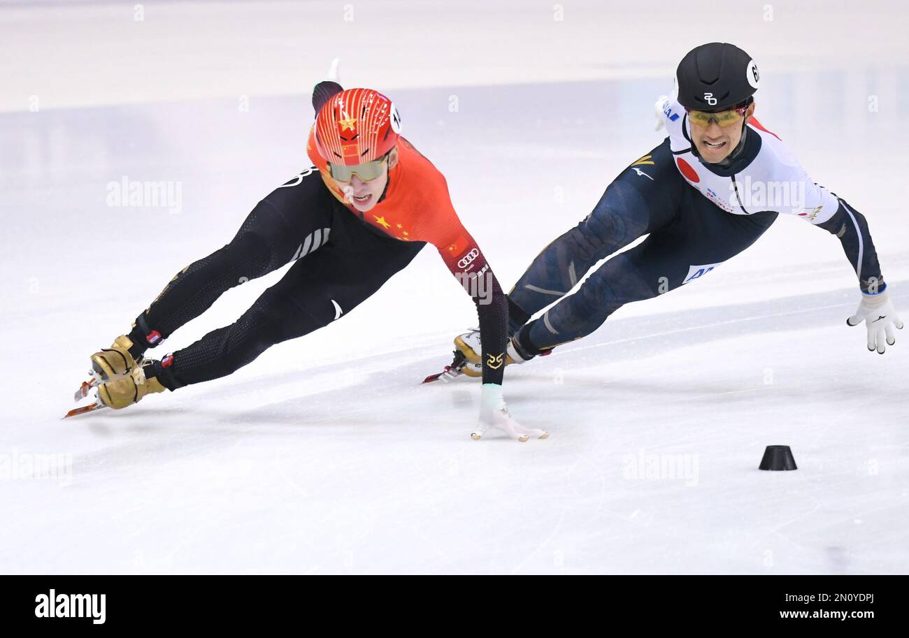 Dresden, Germany. 5th Feb, 2023. Lin Xiaojun (L) of China competes ...