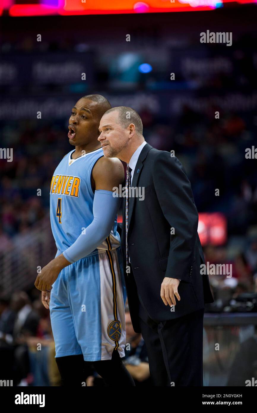 Denver Nuggets head coach Michael Malone talks with guard Randy Foye (4 ...