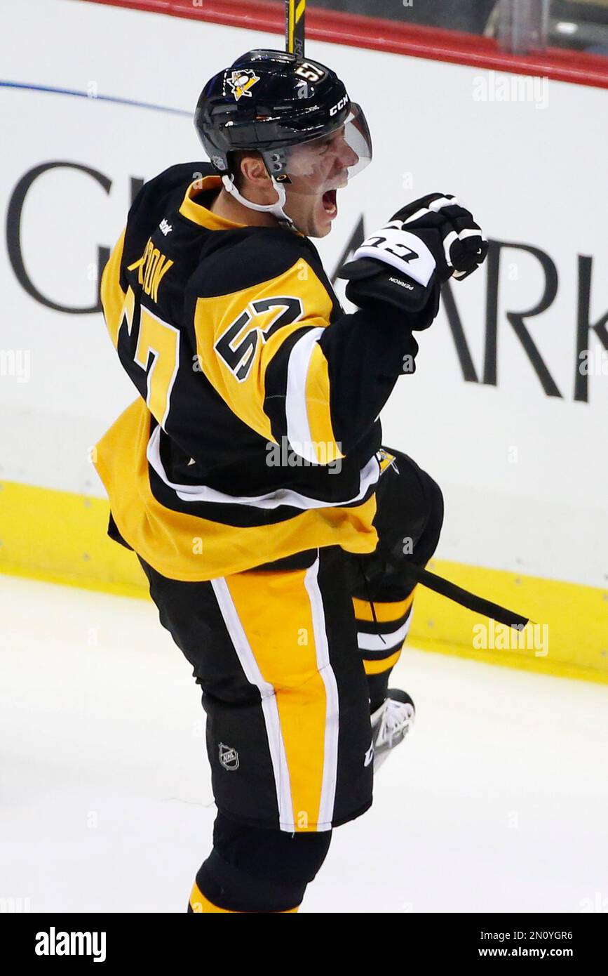Pittsburgh Penguins' David Perron (57) celebrates his goal in the first ...
