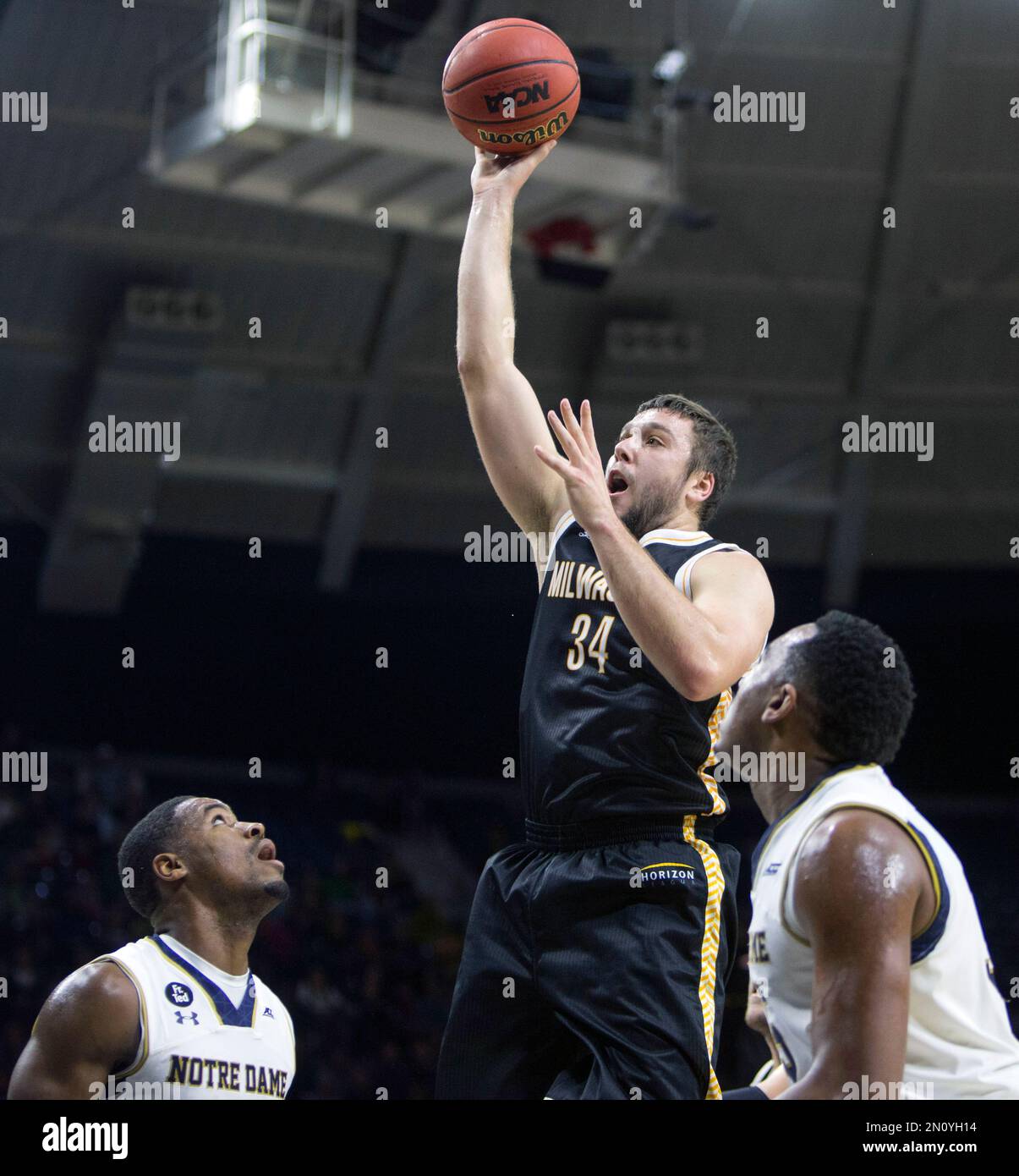Milwaukee’s AustinArians (34) shoots over Notre Dame’s Demetrius ...