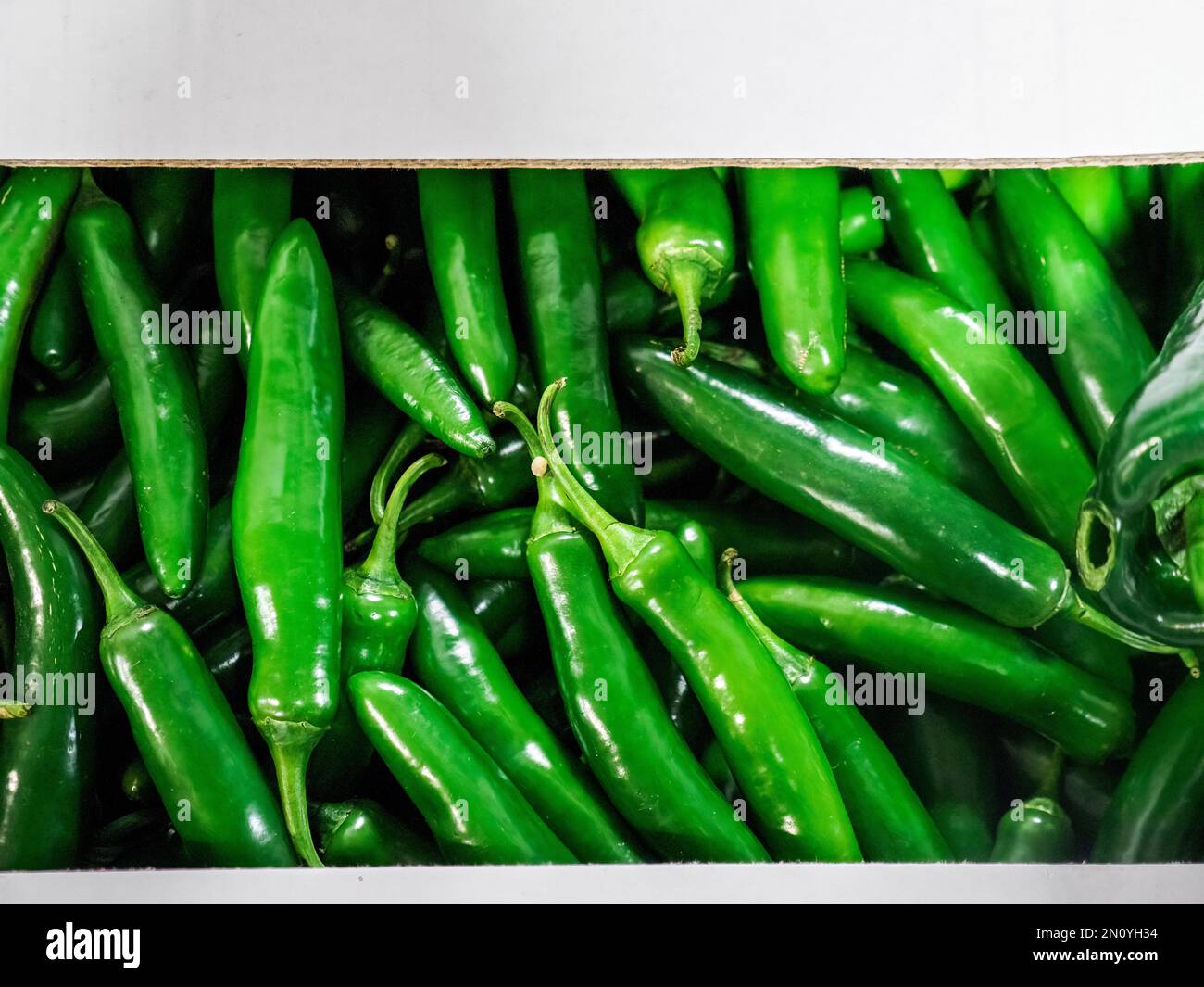 Package of many peppers, jalapeno spicy green healthy Stock Photo - Alamy