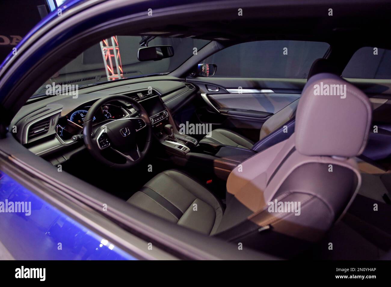 The Honda Civic Coupe production model interior is shown at Honda’s ...