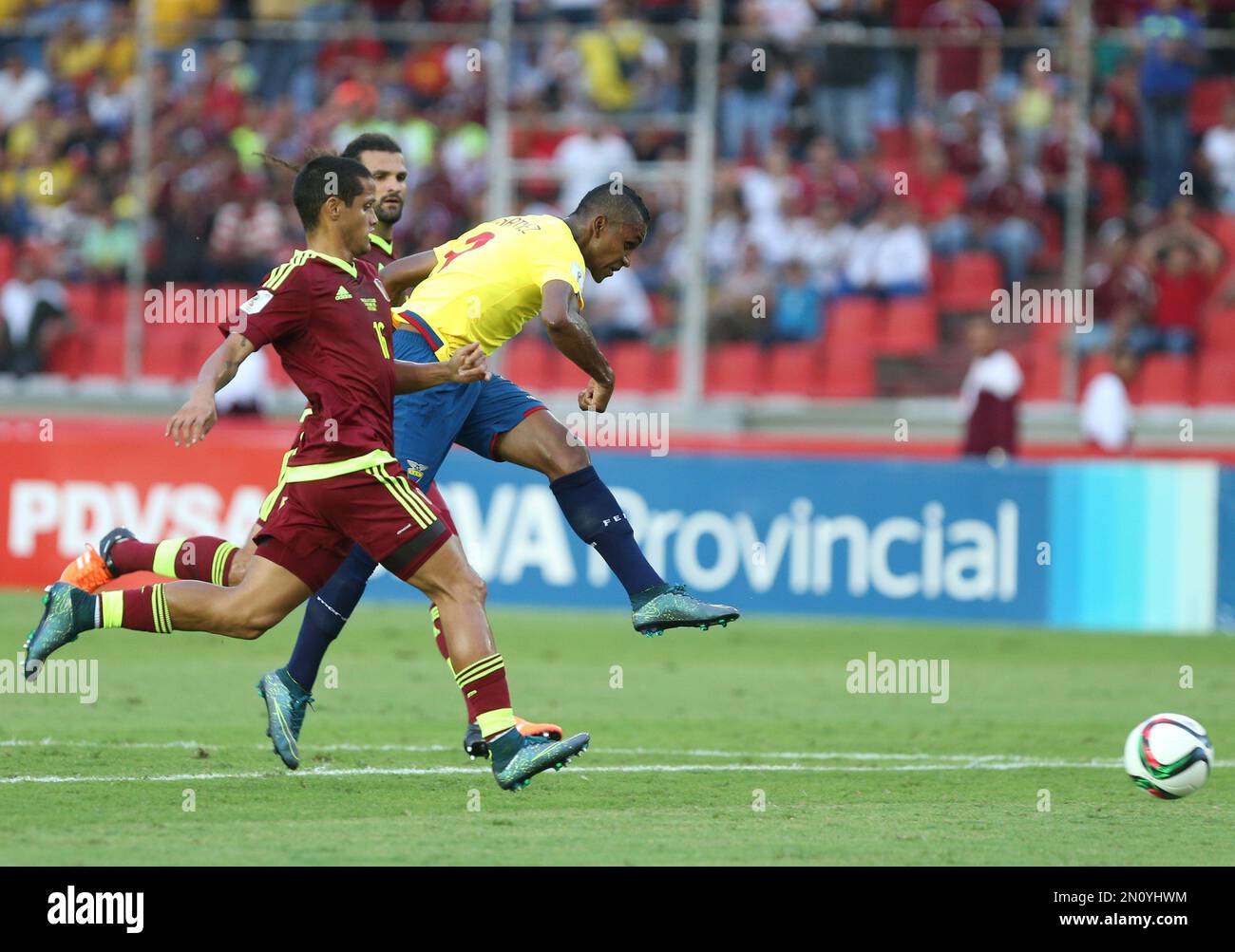 Ecuador's Fidel Martinez, right, strikes the ball to score against ...